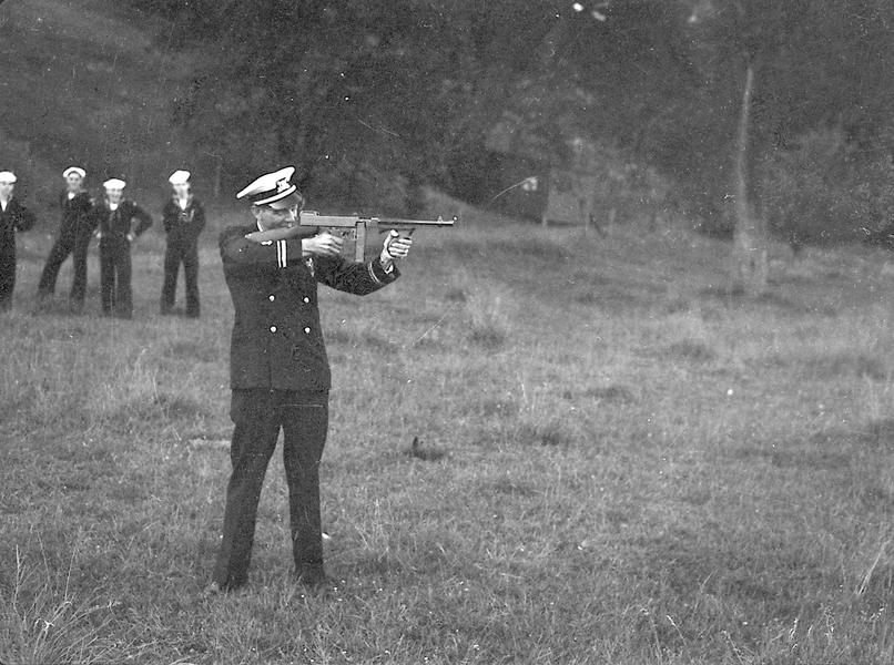 ‎Sea Scout Skipper with submachine gun - UWDC - UW-Madison Libraries