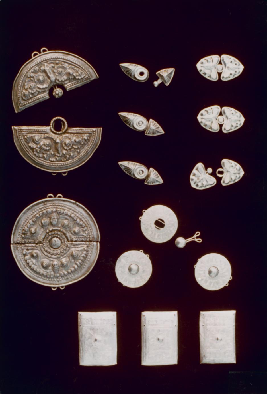 ‎A collection of five different kinds of fasteners for blouses used by ...