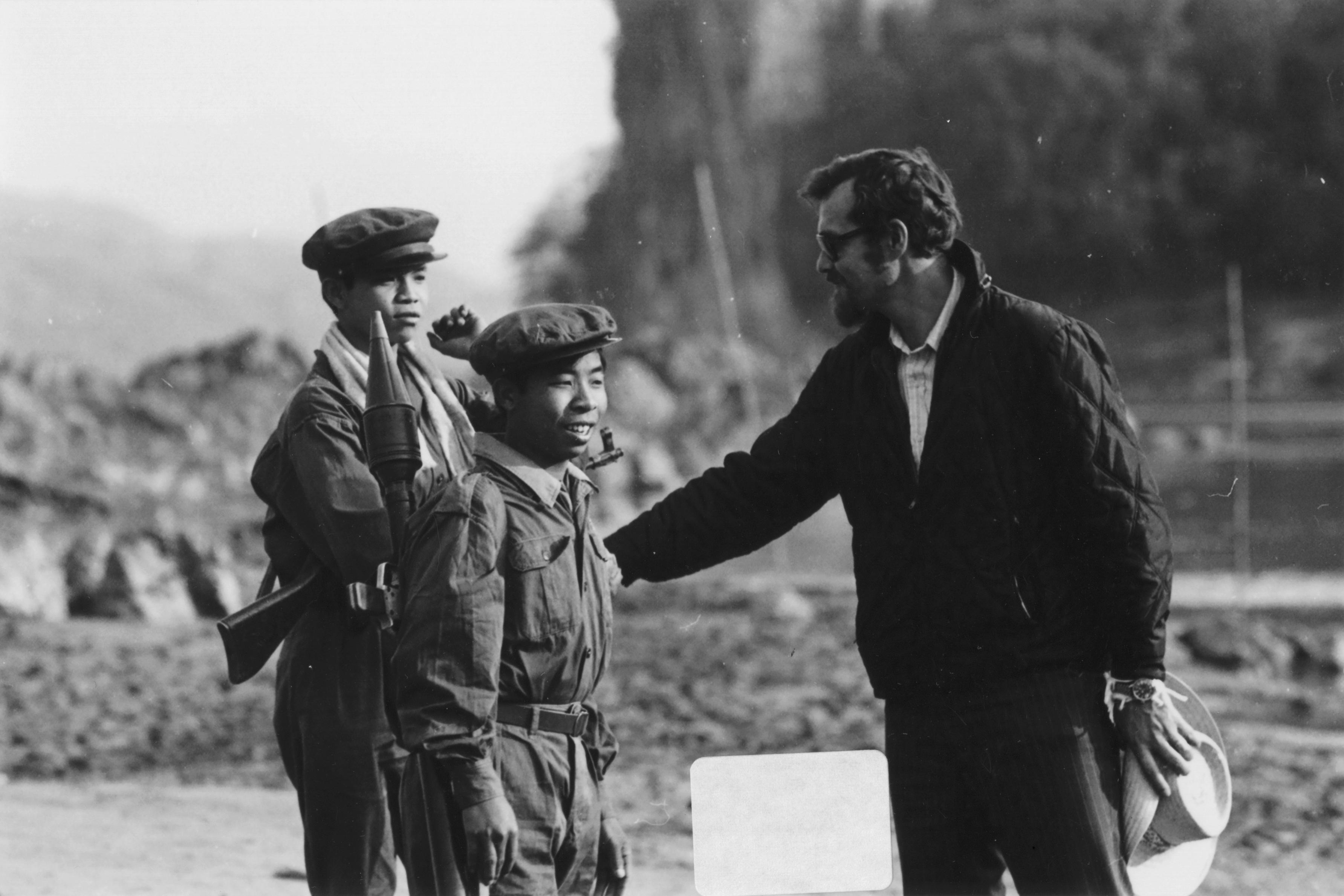 ‎Pathet Lao soldiers and USAID official - UWDC - UW-Madison Libraries