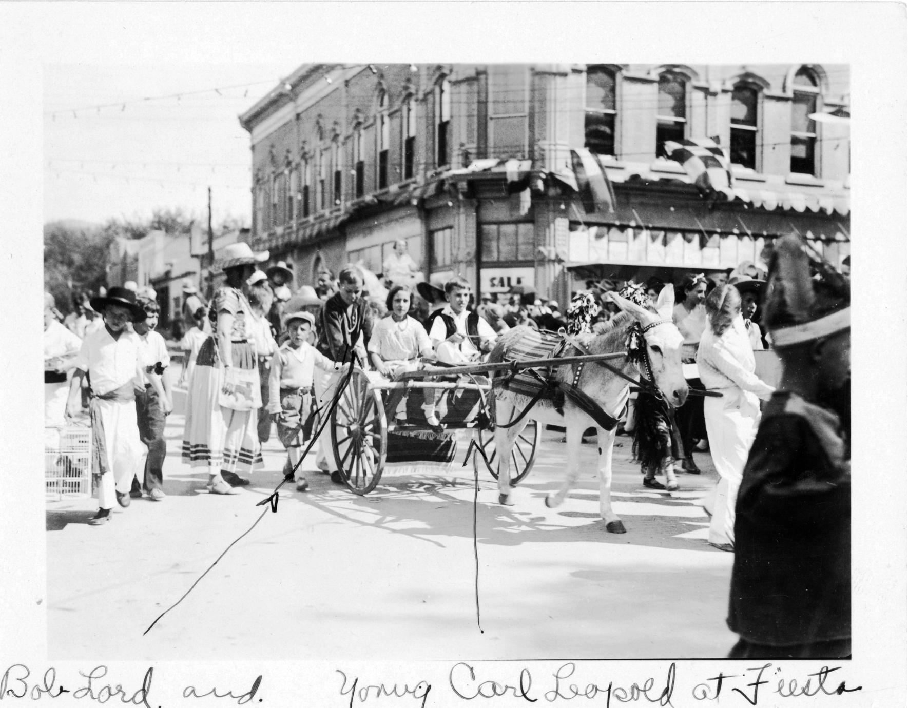 ‎Bob Lord and young Carl Leopold at fiesta - UWDC - UW-Madison Libraries