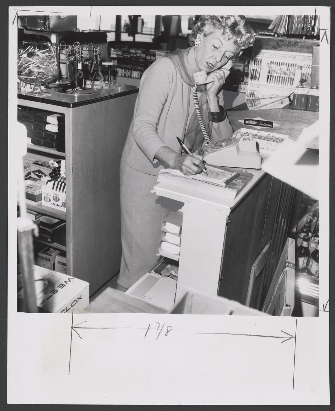 ‎Woman takes an order over the phone - UWDC - UW-Madison Libraries