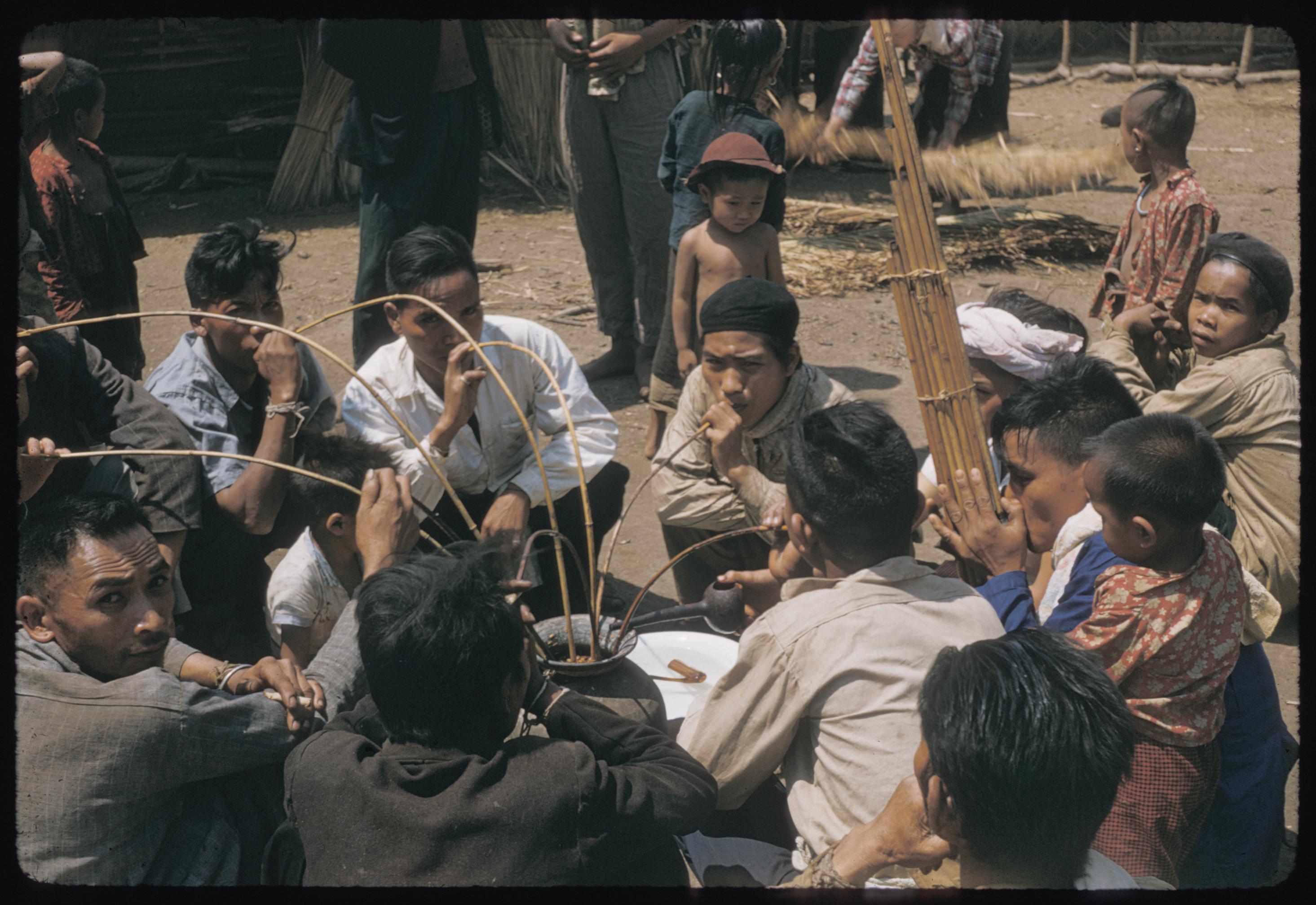 ‎Kammu (Khmu') drinking rice wine - UWDC - UW-Madison Libraries